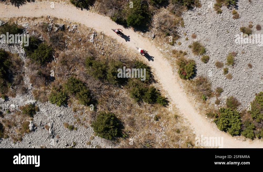 Top View Of People Riding A Bicycle Leading Towards Krka National Park ...