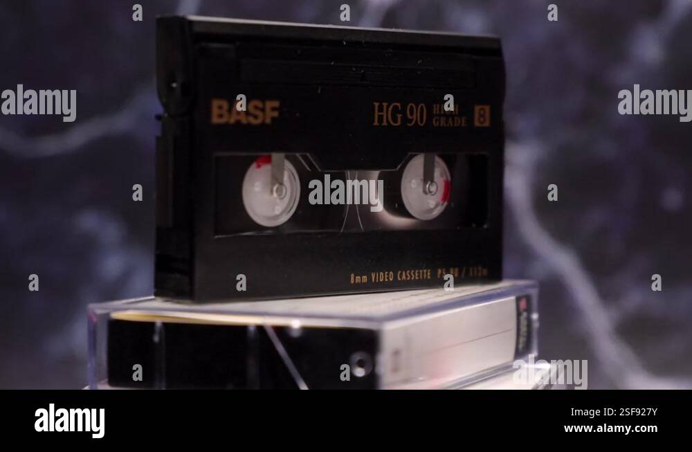 Old BASF Hi8 Video Cassette Spinning On Marble Background. Horizontal ...