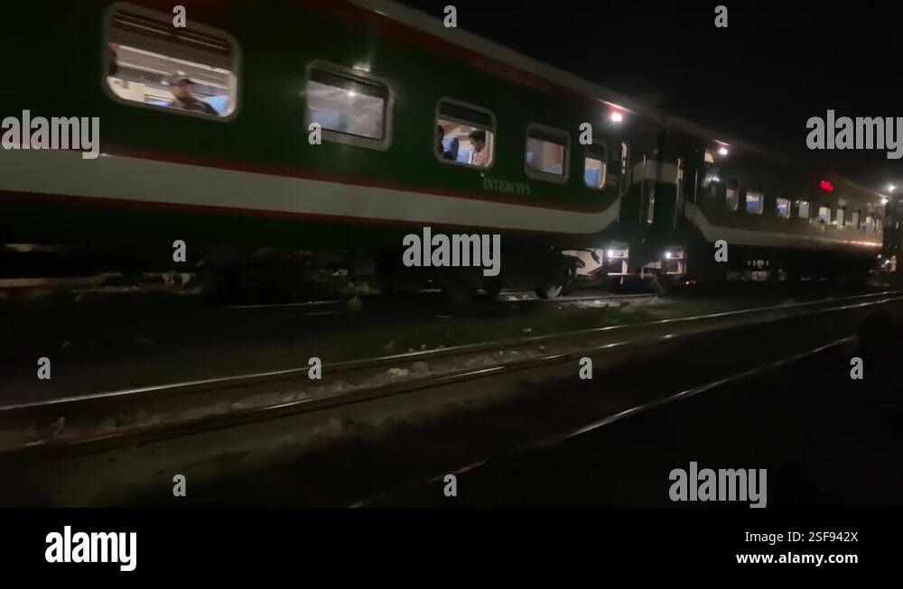 Green Intercity Train Going Past At Night In Dhaka, Bangladesh. Follow ...
