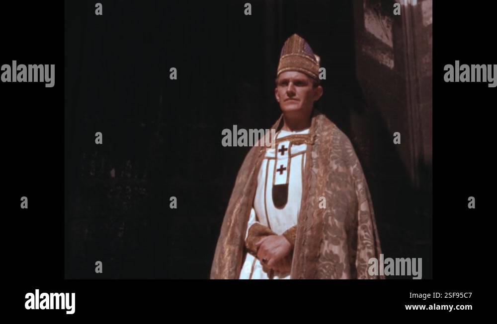 1960s: Catholic church priests in robes on steps of church. Priest ...