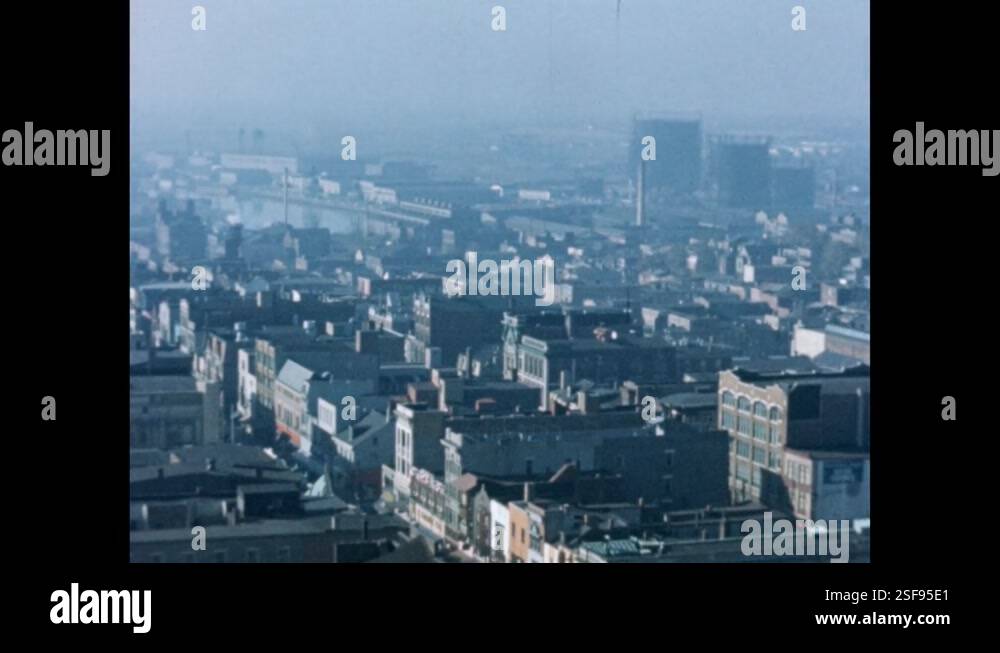 1950s: City buildings sit near industrial factories and fuel tanks on ...