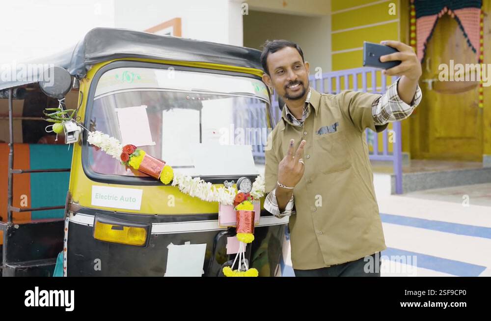 Auto driver taking selfie with his auto rickshaw to post on social ...