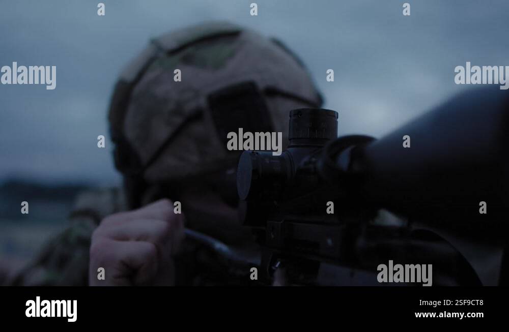 An armed special forces soldier on a military operation reloads sniper ...