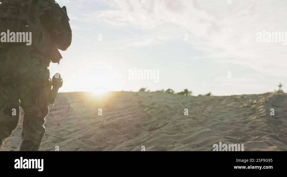 Soldiers marching on sand, field exercises, training ground ...
