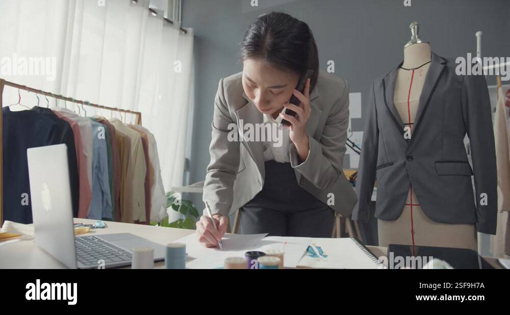 Designer call smartphone to customer confirm purchase order online ...