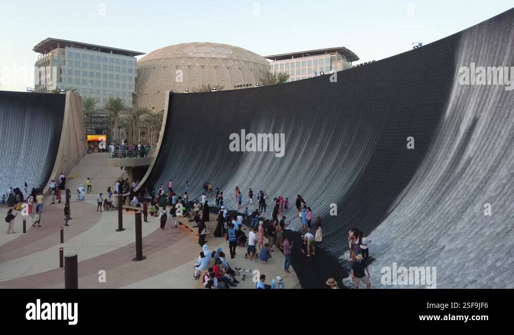 Water feature at Expo 2020 in Dubai, tourists enjoying majestic ...