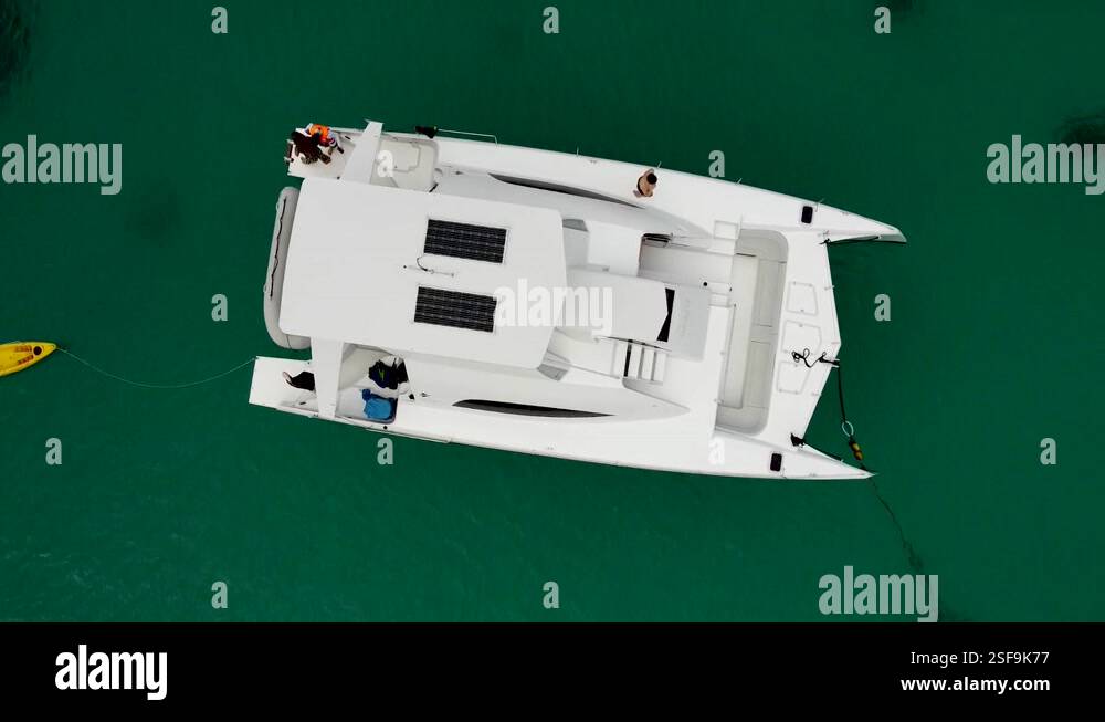 Top view of a motor catamaran, a motor catamaran with tourists on board ...