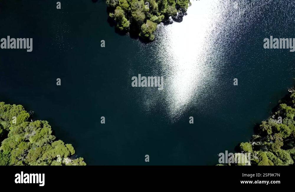 Uphill zenithal view overlooking the heart-shaped lagoon in the south ...