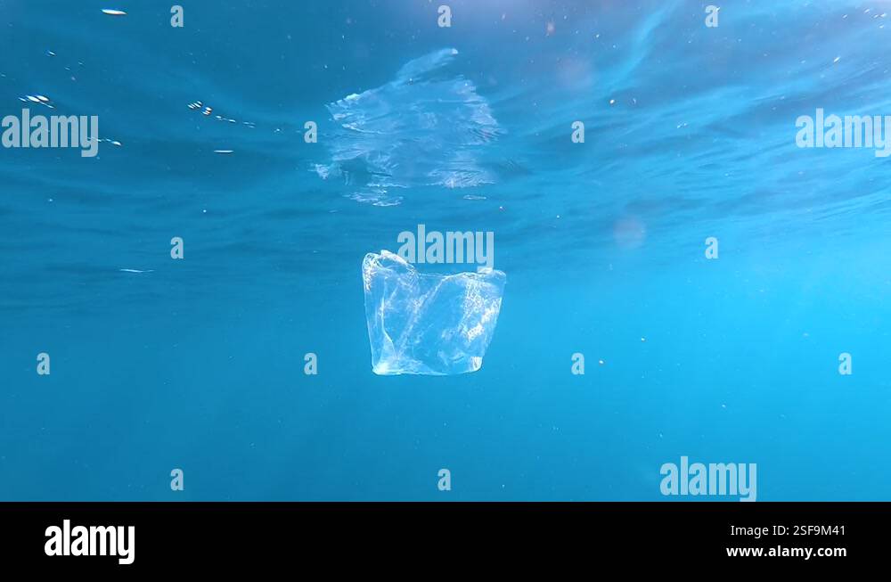 A plastic bag floating in the surface. Slow motion and filmed from ...