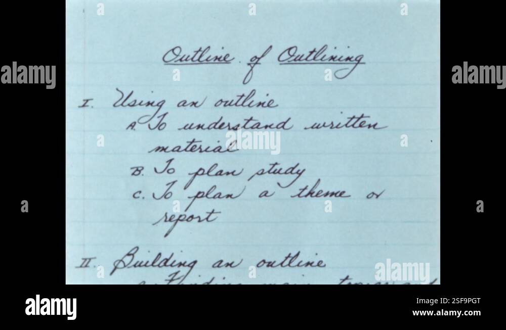 1950s: Handwritten report outline is displayed on notebook paper. Boy ...