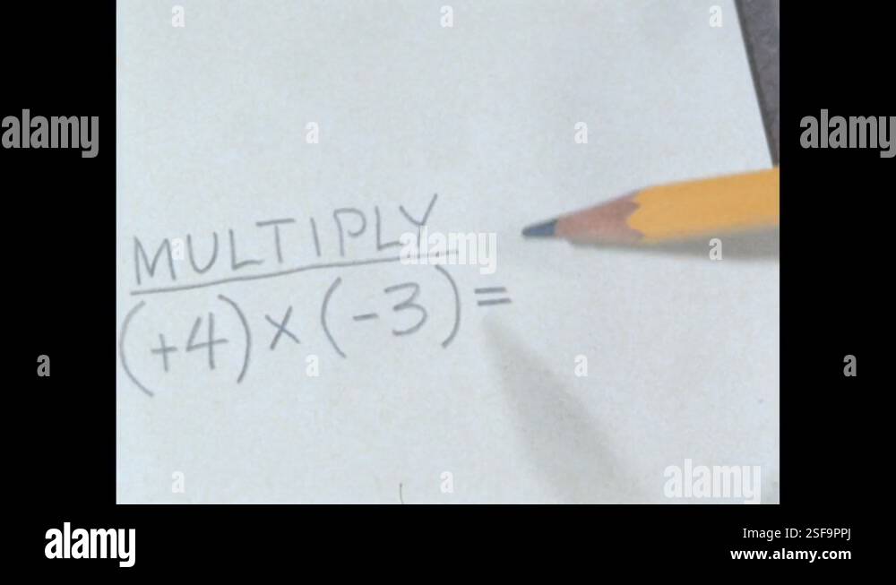 1960s: Close up, equation written on paper, pencil writes in solution ...