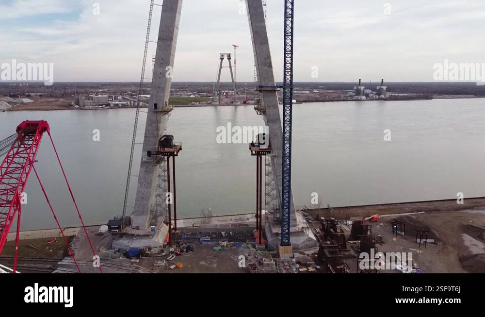 Gordie Howe Bridge Suspension Towers in line during Drone Rising Boom ...