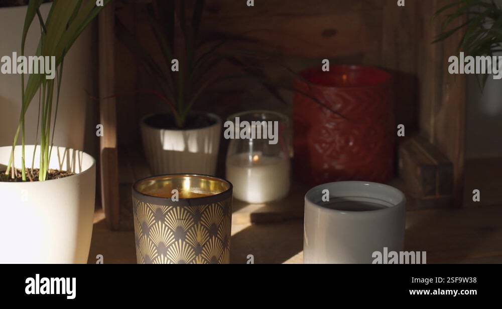 Flower pots and candles on the ground, medium shot Stock Video Footage ...