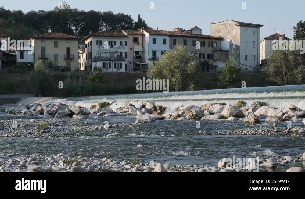 River Serchio in Lucca (Italy) next to the bridge Ponte San Quirico in ...