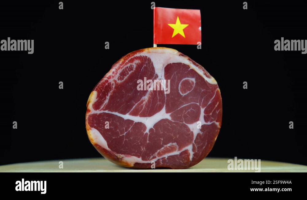 Delicious smoked tenderloin with small flag of Vietnam, piece of meat ...