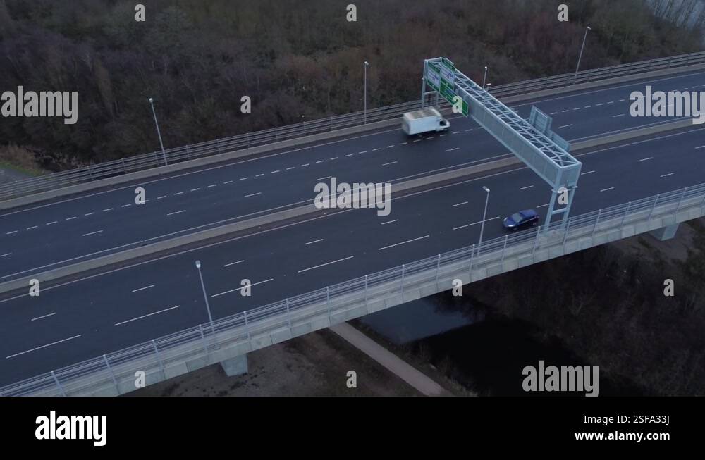 Mersey gateway toll bridge highway traffic driving across river estuary ...