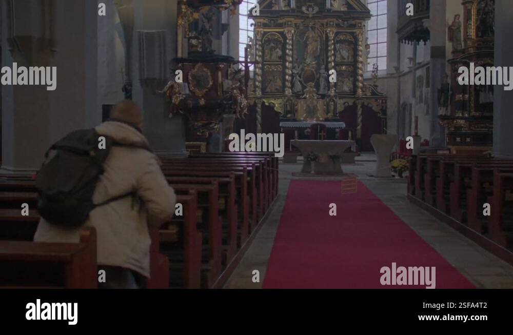 back man in church. Visiting religious building after mental breakdown ...
