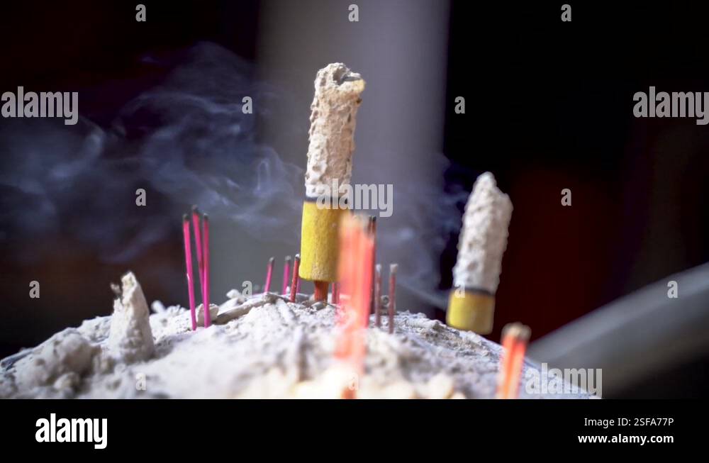 Burned joss stick, incense stick in a censer in Chinese temple Stock ...