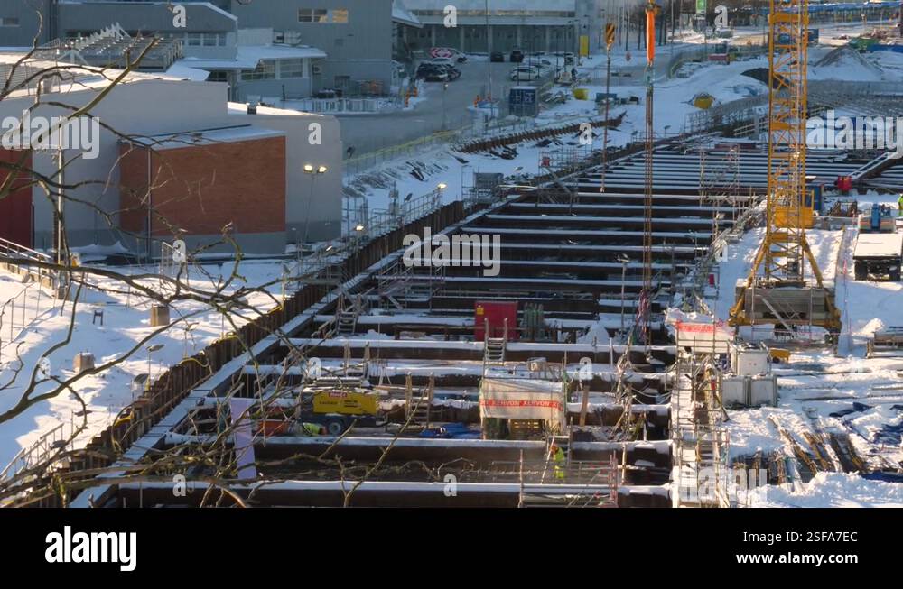 Construction Workers And Machinery At The Development Site Of West Link ...