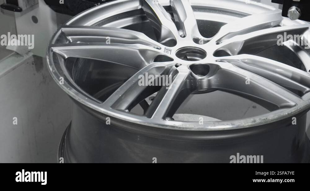 Slow movement over a curbed aluminium wheel before diamond cutting, in ...