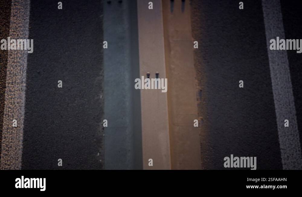 Closeup car driving highway in morning. Freeway crash barrier view ...