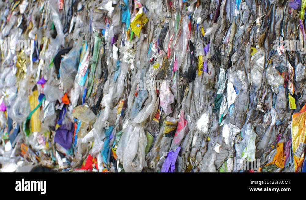 Stack of different types of large garbage dump, plastic bags, and ...
