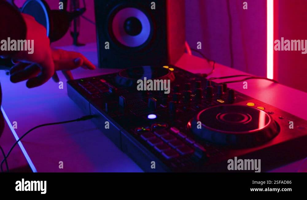 DJ mix studio audio tracks mixing buttons pads decks mixing console frequencies Stock Video ...