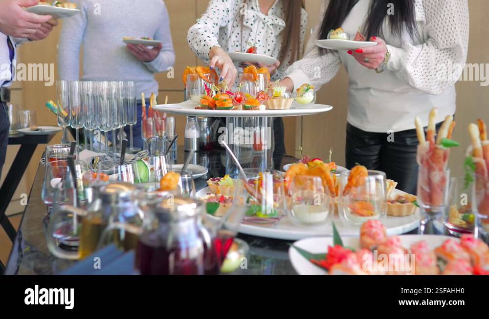 Meals for a group of people, buffet in a luxury office, close-up. The ...