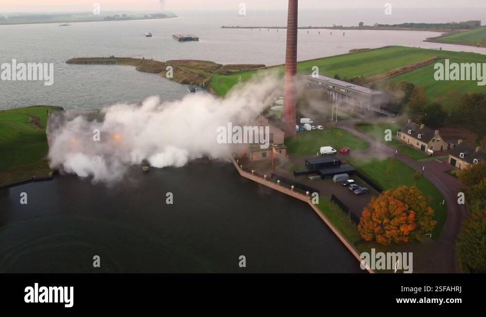 Steam rising up from the ir. D.F. Woudagemaal Steam Pumping Station in ...