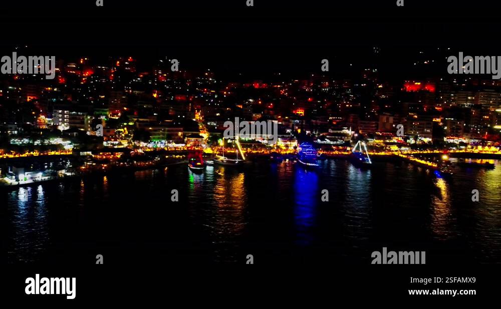 Beautiful aerial view of the city of Saranda at night in Albania ...