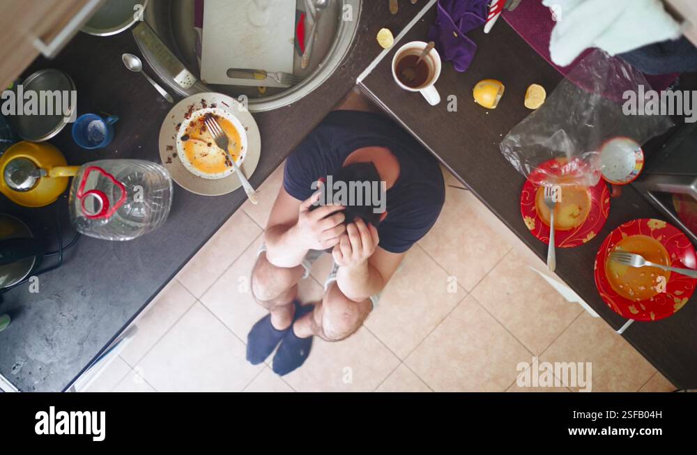 Frustrated Man Crying while Sitting on Floor Kitchen Full Dirty Dishes ...