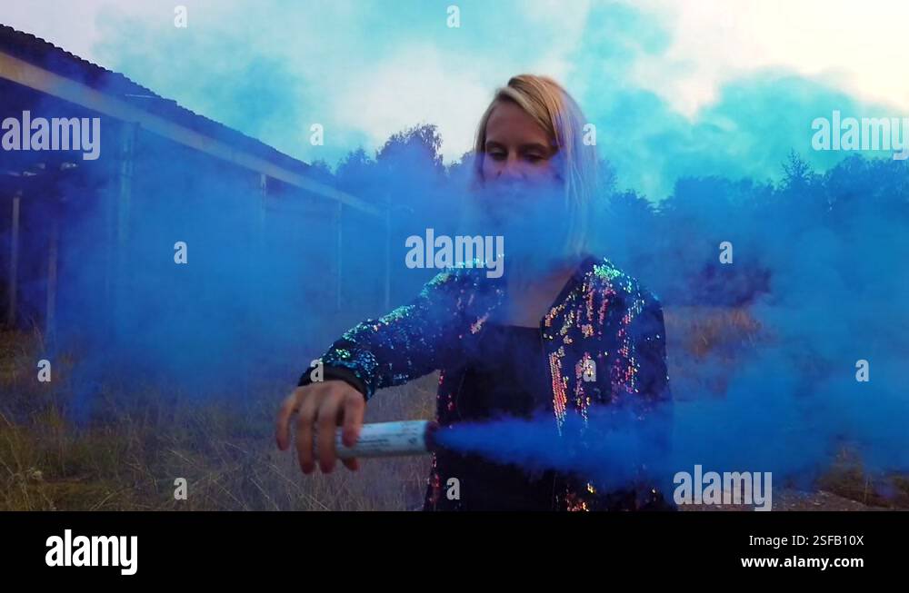 Perfect slow motion cinematic shot of a girl in front of a tank Stock ...