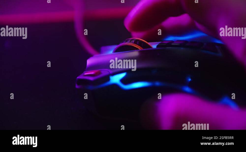 Close up shot of a hand scrolling the mouse wheel while playing games ...
