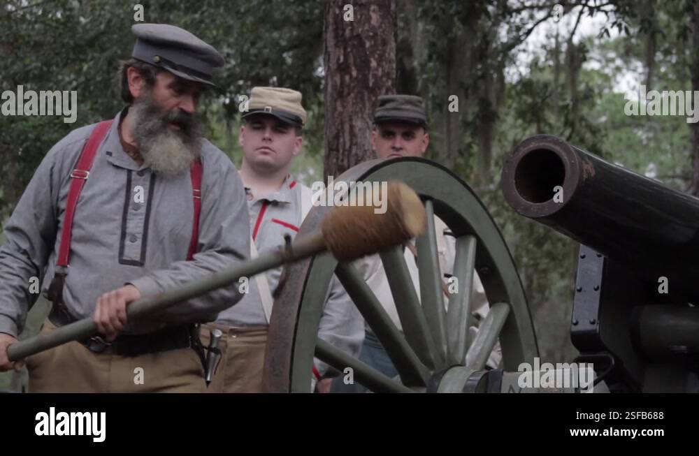 American Civil War Reenactment - before battle, Confederate Cannon ...