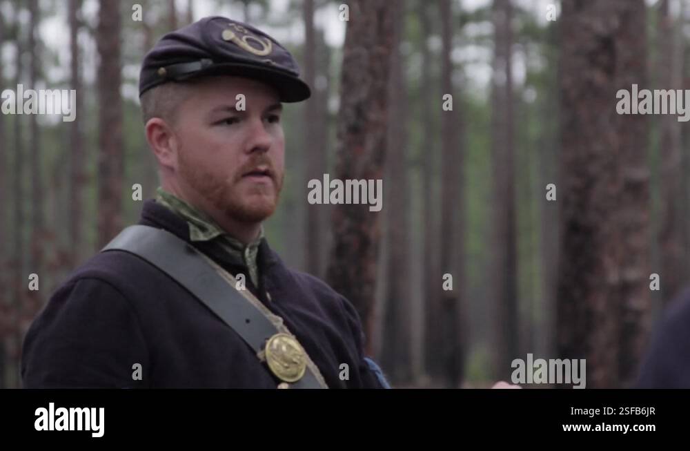 Civil War Union Re-enactor Sergeant commands in Soldier Camp Stock ...