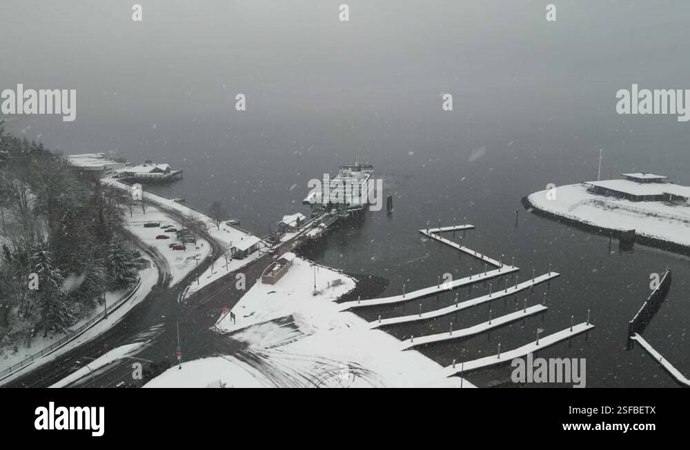 Cars slowly unload from a Washington State ferry at Point Defiance ...