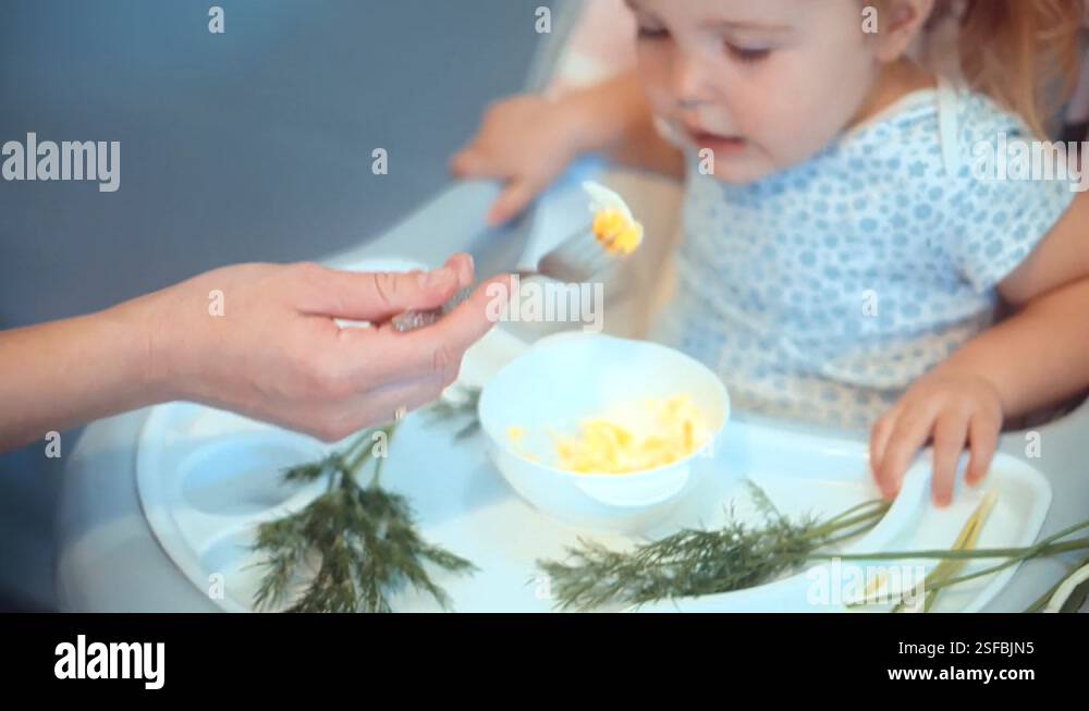 Infant Baby Eating. Cute Child Little Girl Eating Healthy Food. Kid ...