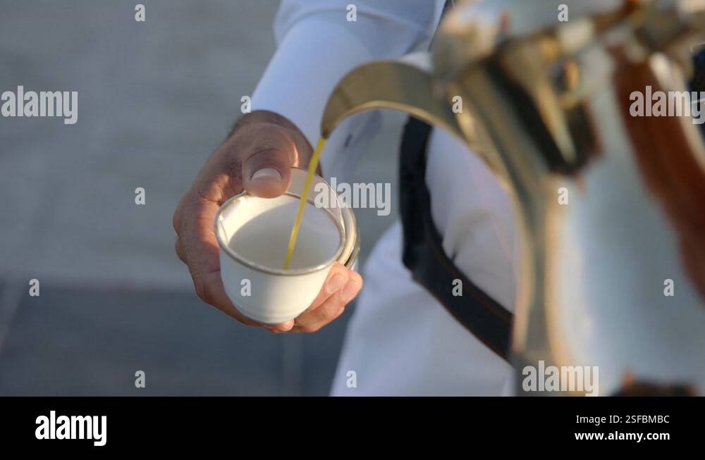 Traditional tea (karak) in doha, qatar Stock Video Footage - Alamy