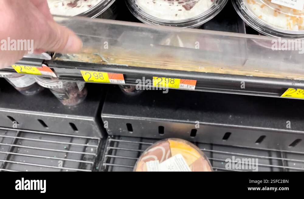 Walmart grocery store interior disgusting sludge build up in cake case ...