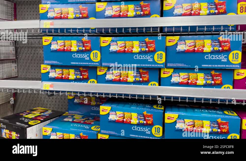 Walmart retail grocery store pan of family box of Frito Lay and price ...
