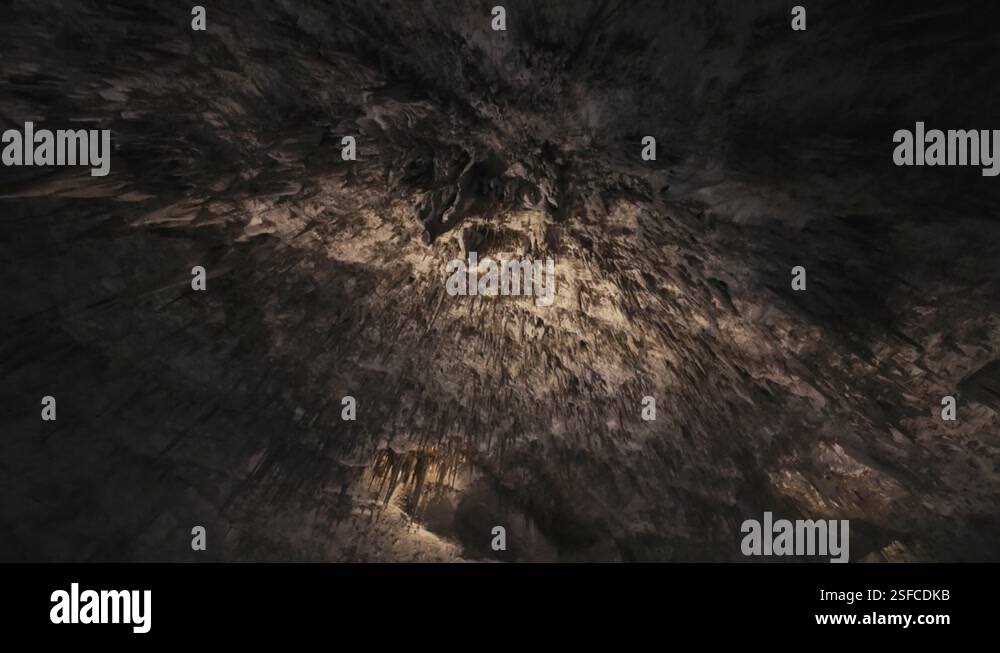 Sharp Speleothems Stalactites Hanging in Dark Underground Cave In ...