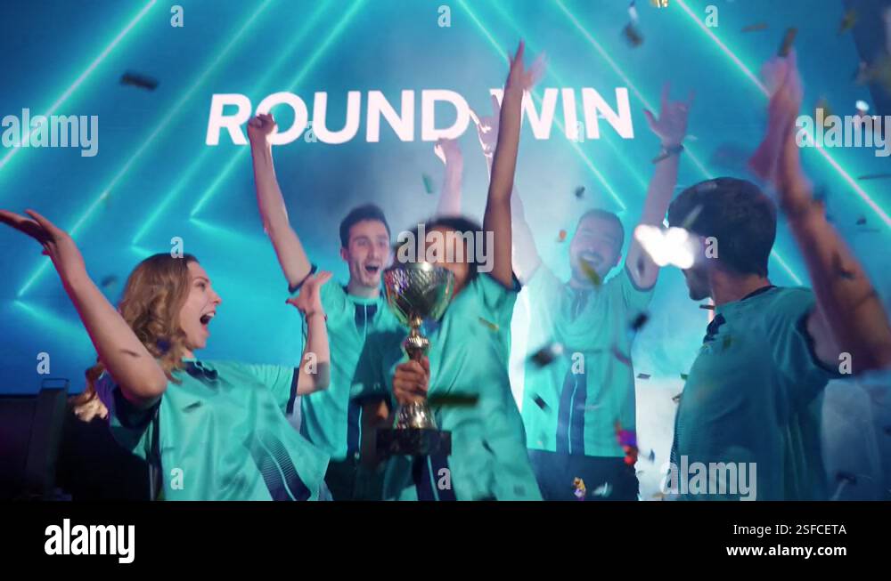 Slow motion, emotions of victory, the team of esports players rejoices ...