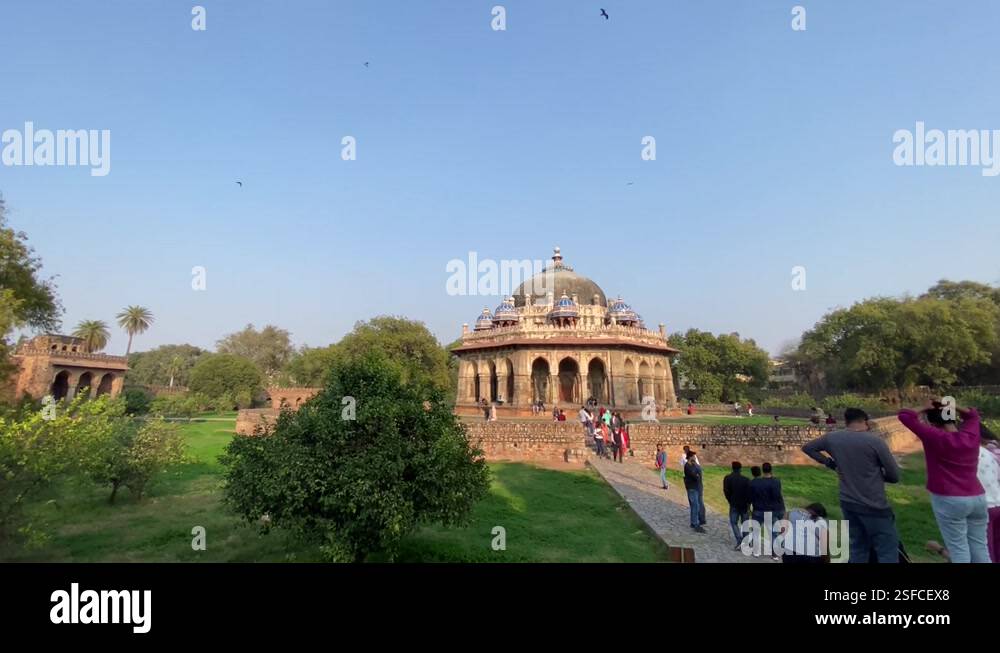 People visit Isa Khan's Tomb. Isa Khan's tomb is situated near the ...