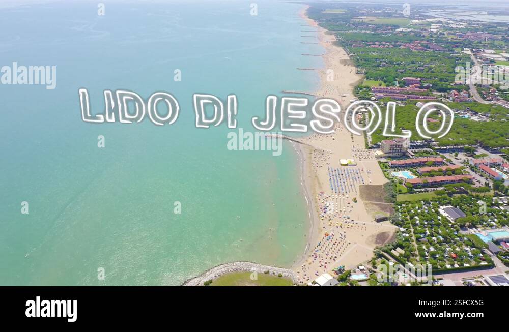Inscription on video. Italy, Jesolo. Lido di Jesolo, or Jesolo Lido, is ...
