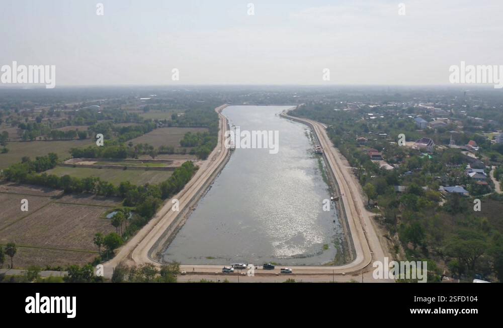 Aerial top view of Bueng Sa Bua Pond. River lake with forest trees ...