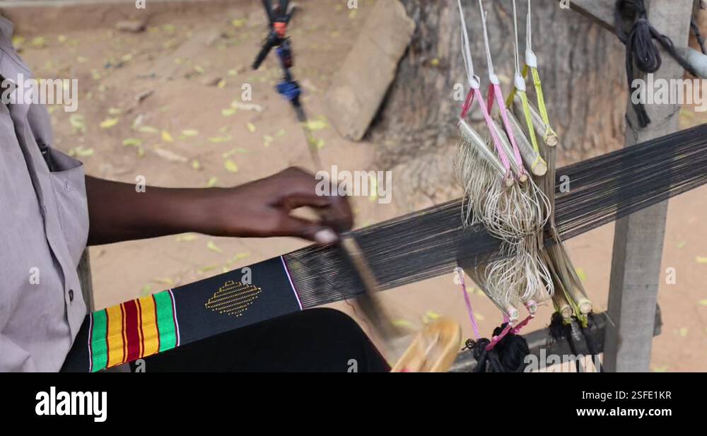 Man on hand loom making Kente cloth fabric Accra Ghana 4K Stock Video ...