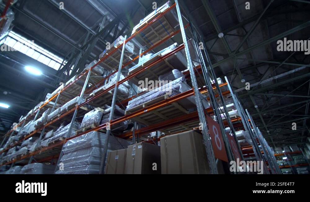 Warehouse with cardboard boxes inside on pallets racks, logistic center ...