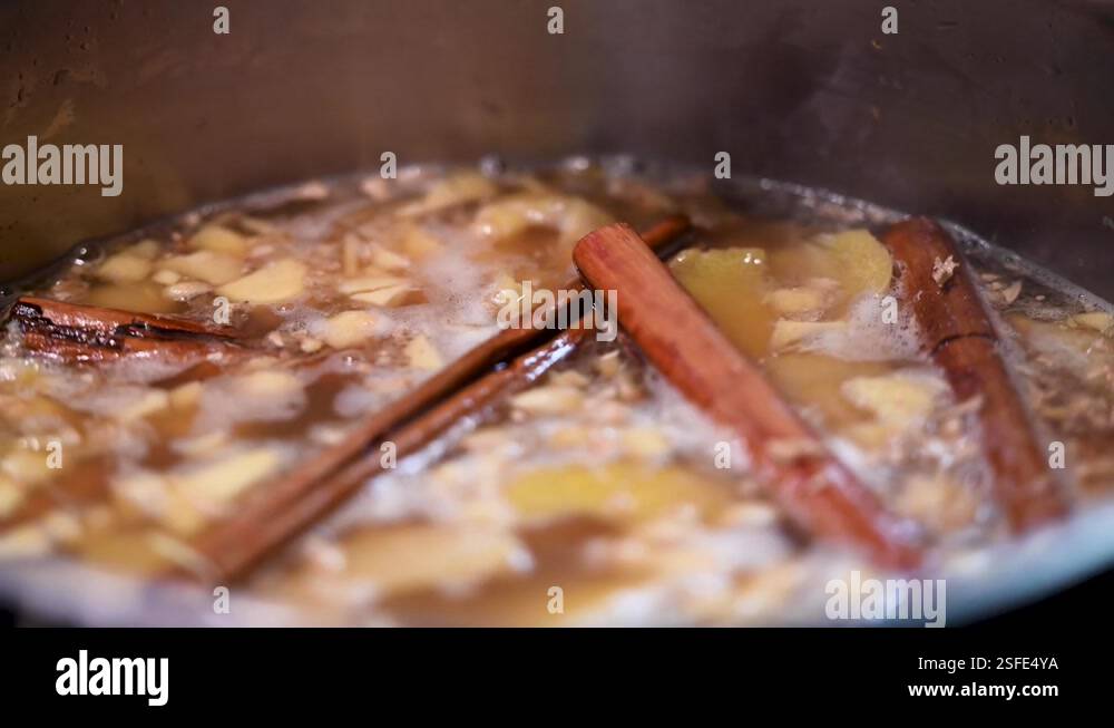A stationary shot of cooking the mixed ingredients in making ginger ...