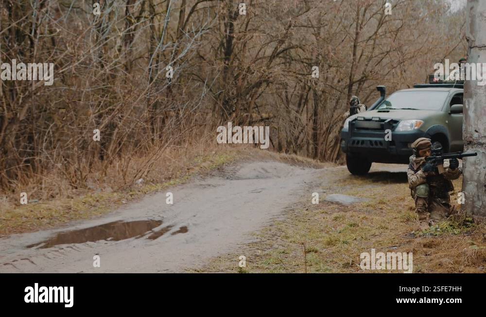 Combat tactical crosshair aim from a maverick rifle by a female soldier ...