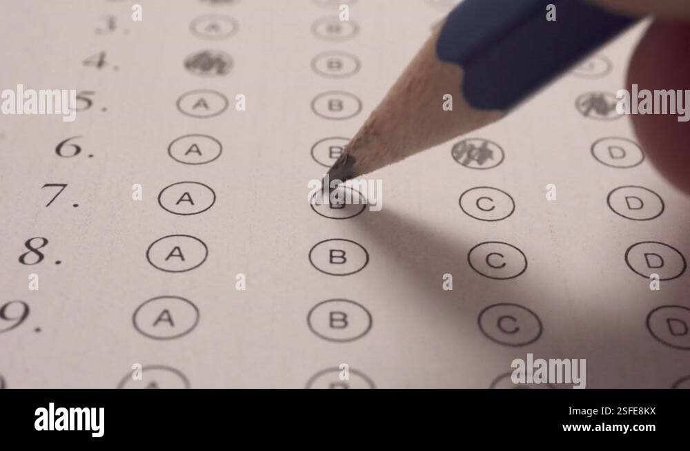 Shading With Pencil The Chosen Correct Answer In Multiple Choice Exam ...